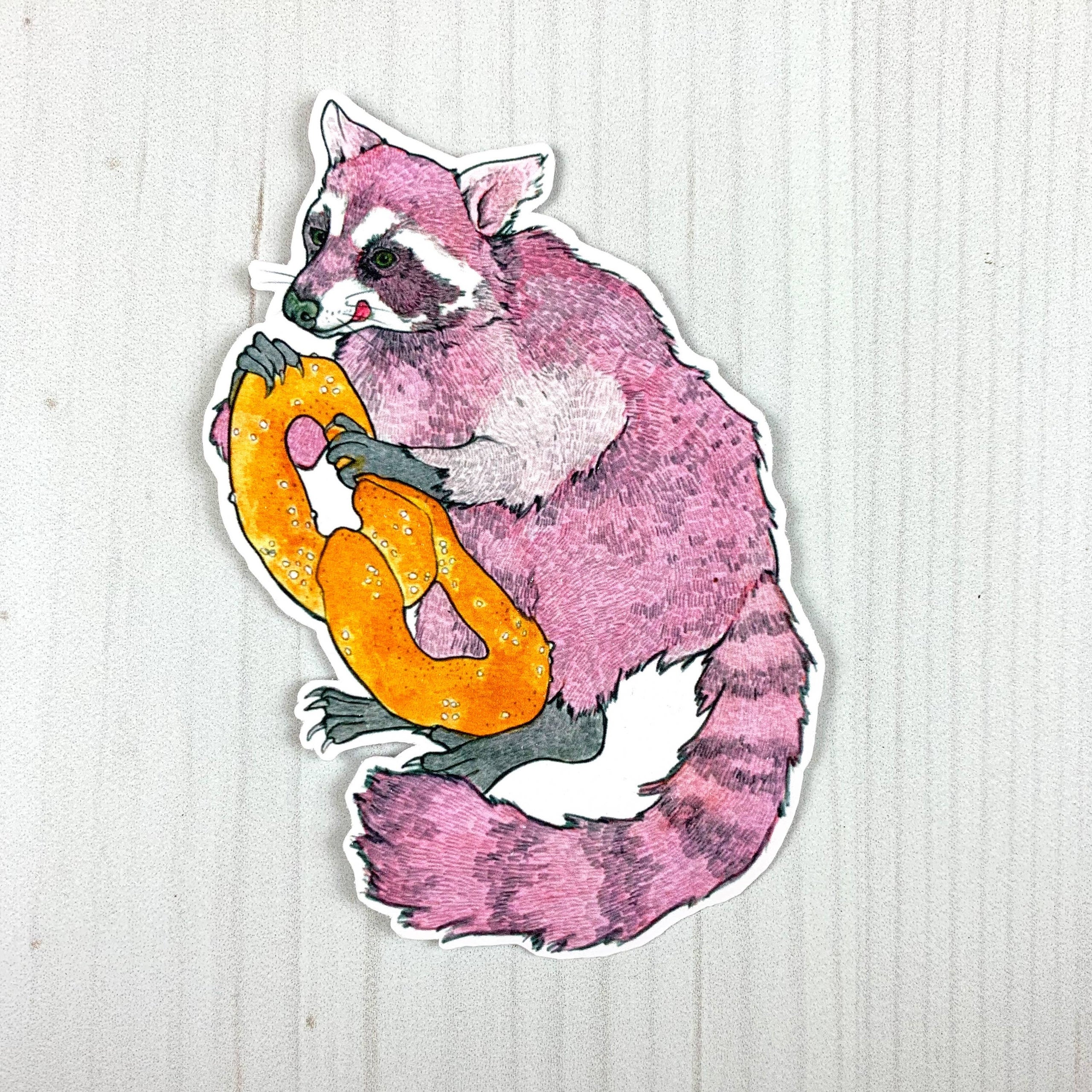 SDT - Raccoon With Pretzel Vinyl Sticker | Walter Anderson Museum of Art